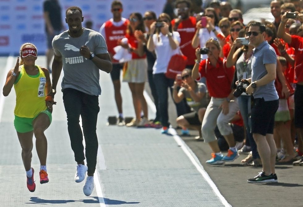 Bolt hace de guía de la atleta ciega más rápida del mundo - AS.com