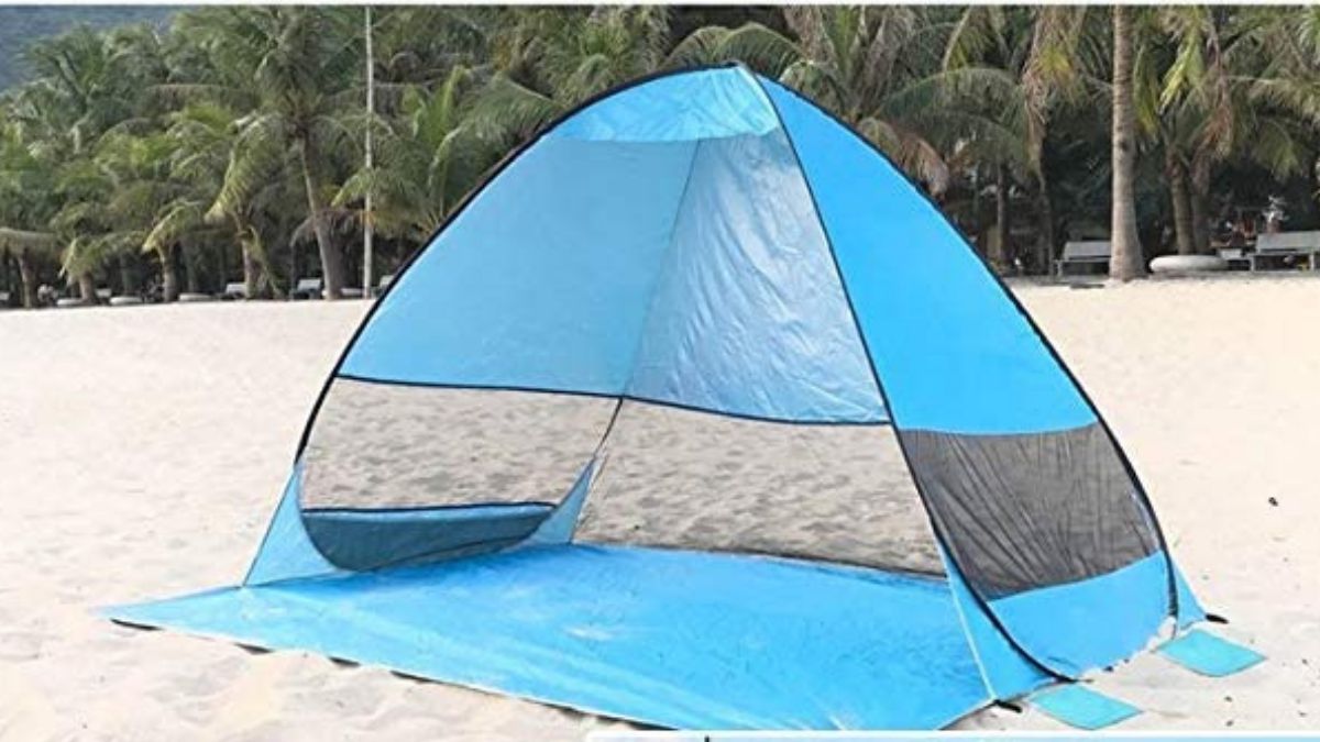 Relájate en la arena con esta carpa para playa plegable con protección ...